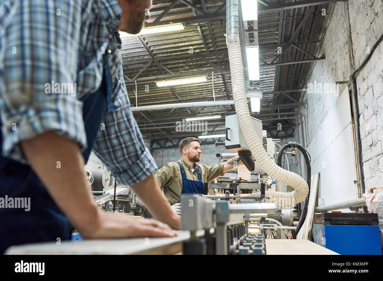 People Working at Modern Factory Stock Photo - Alamy