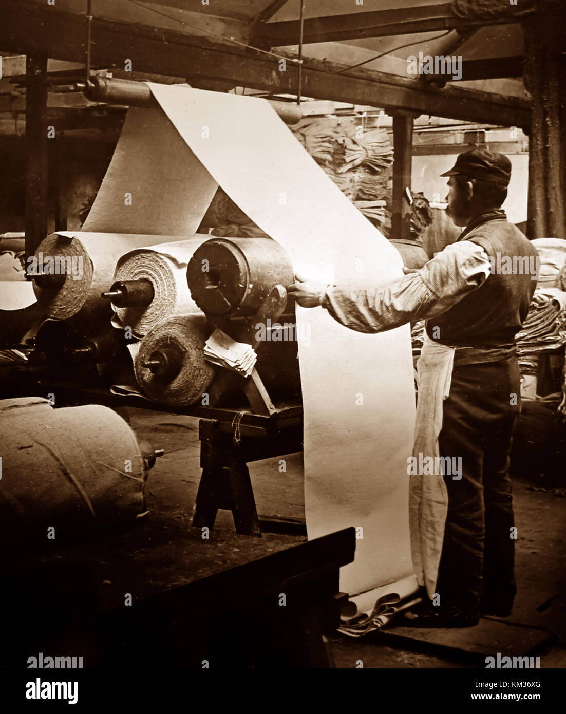 Inspecting linen, linen production, Victorian period Stock Photo - Alamy