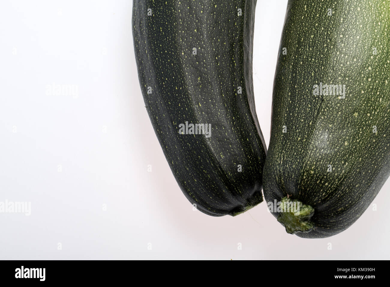 Fresh vegetable courgette. Isolated on white Stock Photo - Alamy