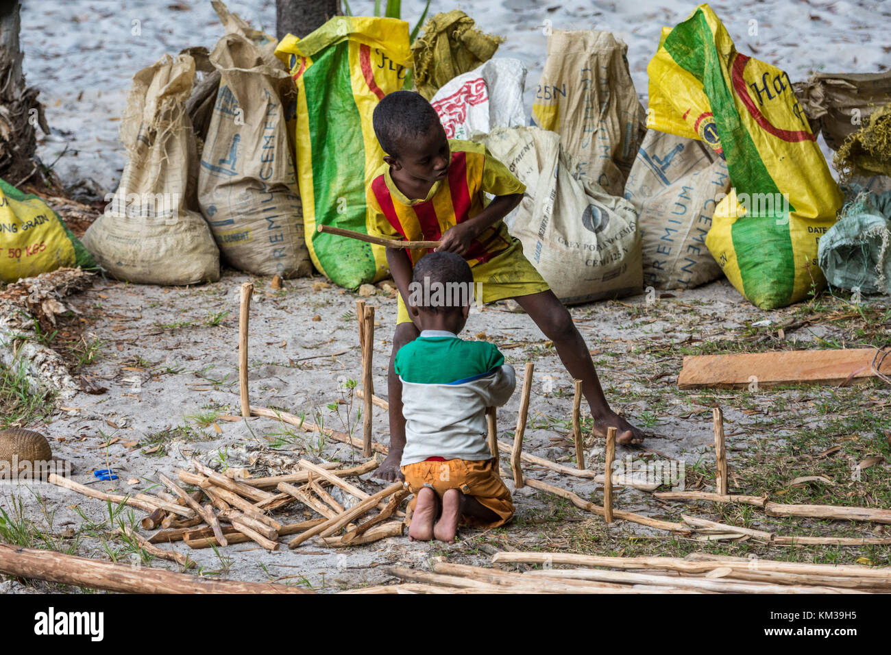 Two young Malagasy boys play in the sand. Madagascar, Africa Stock ...