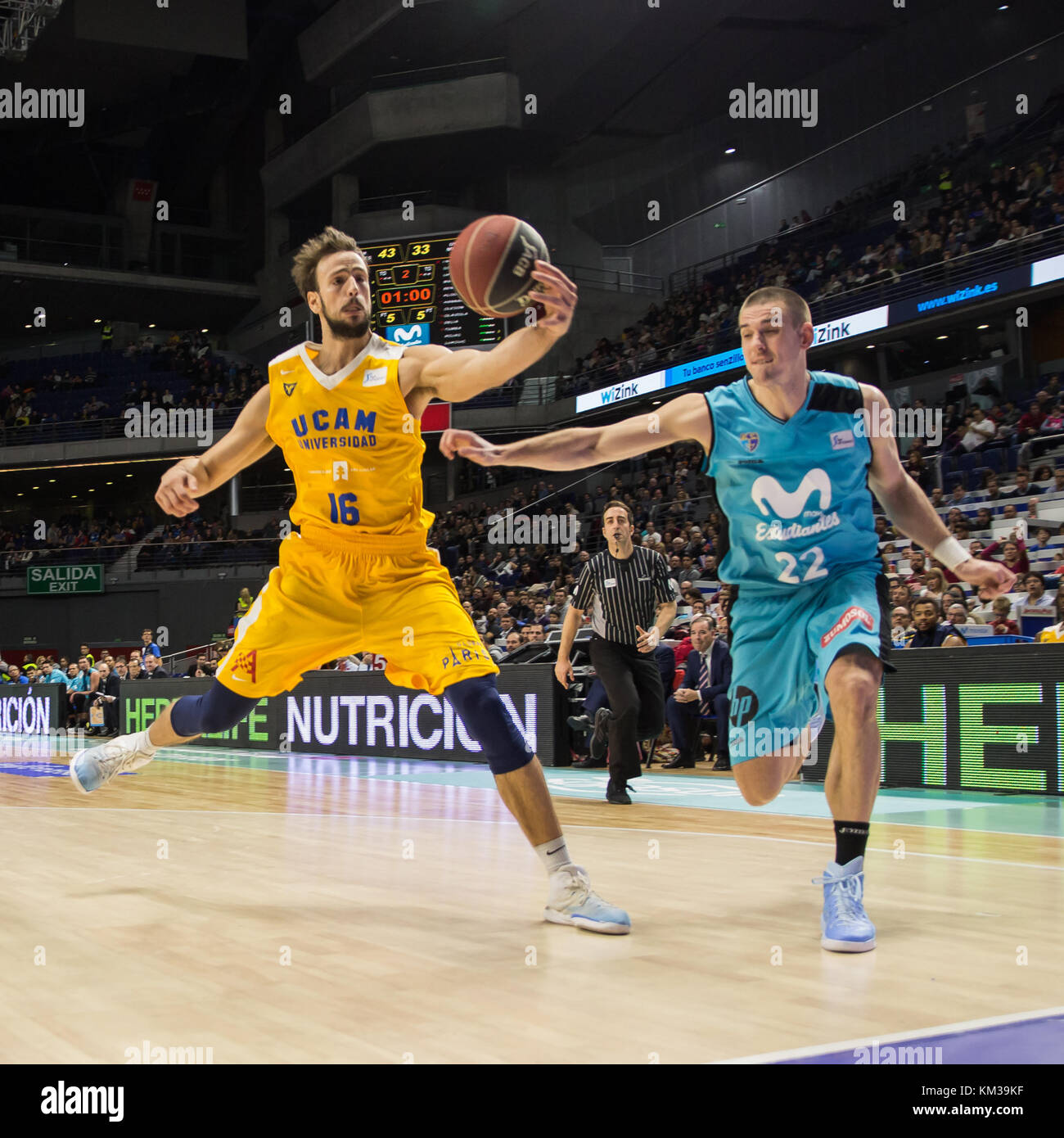 Madrid, Spain. 03rd Dec, 2017. Marcos Delia (yellow) and Nik Caner ...