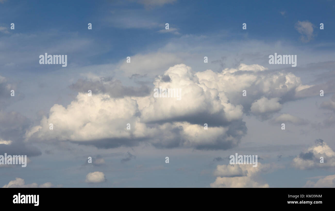 Cumulus clouds background Stock Photo - Alamy