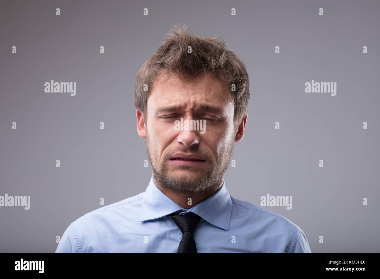 Man screwing up face hi-res stock photography and images - Alamy