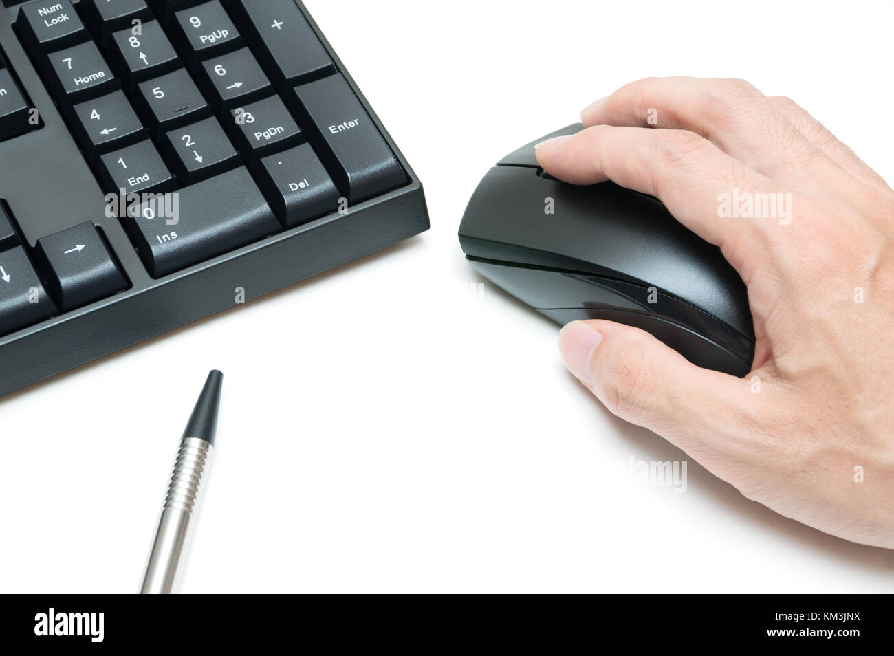Computer keyboard and pen, hand holding mouse isolated on white ...