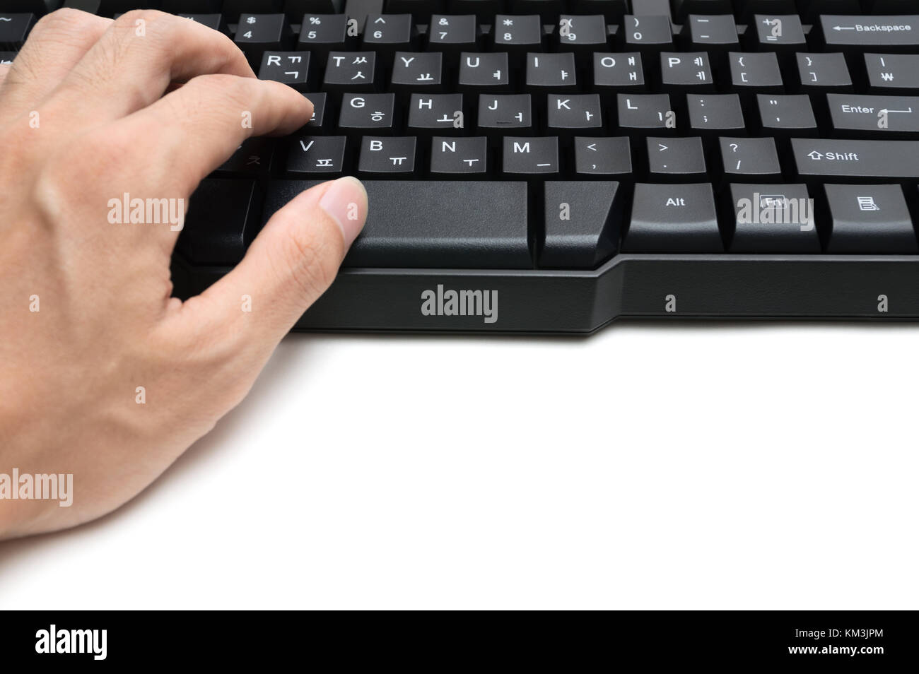 Hand using keyboard on white background Stock Photo - Alamy