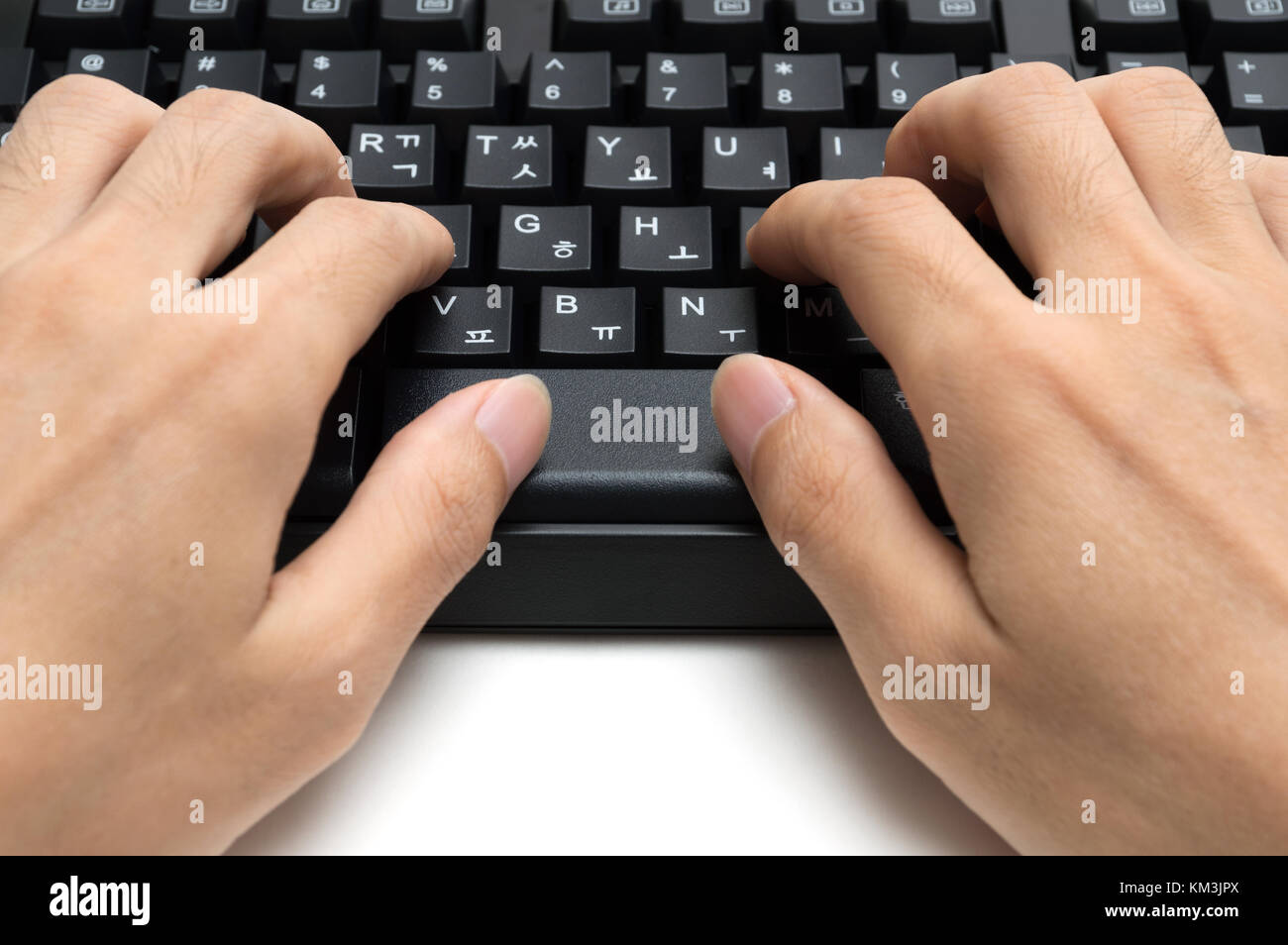 Hands using keyboard on white background Stock Photo - Alamy