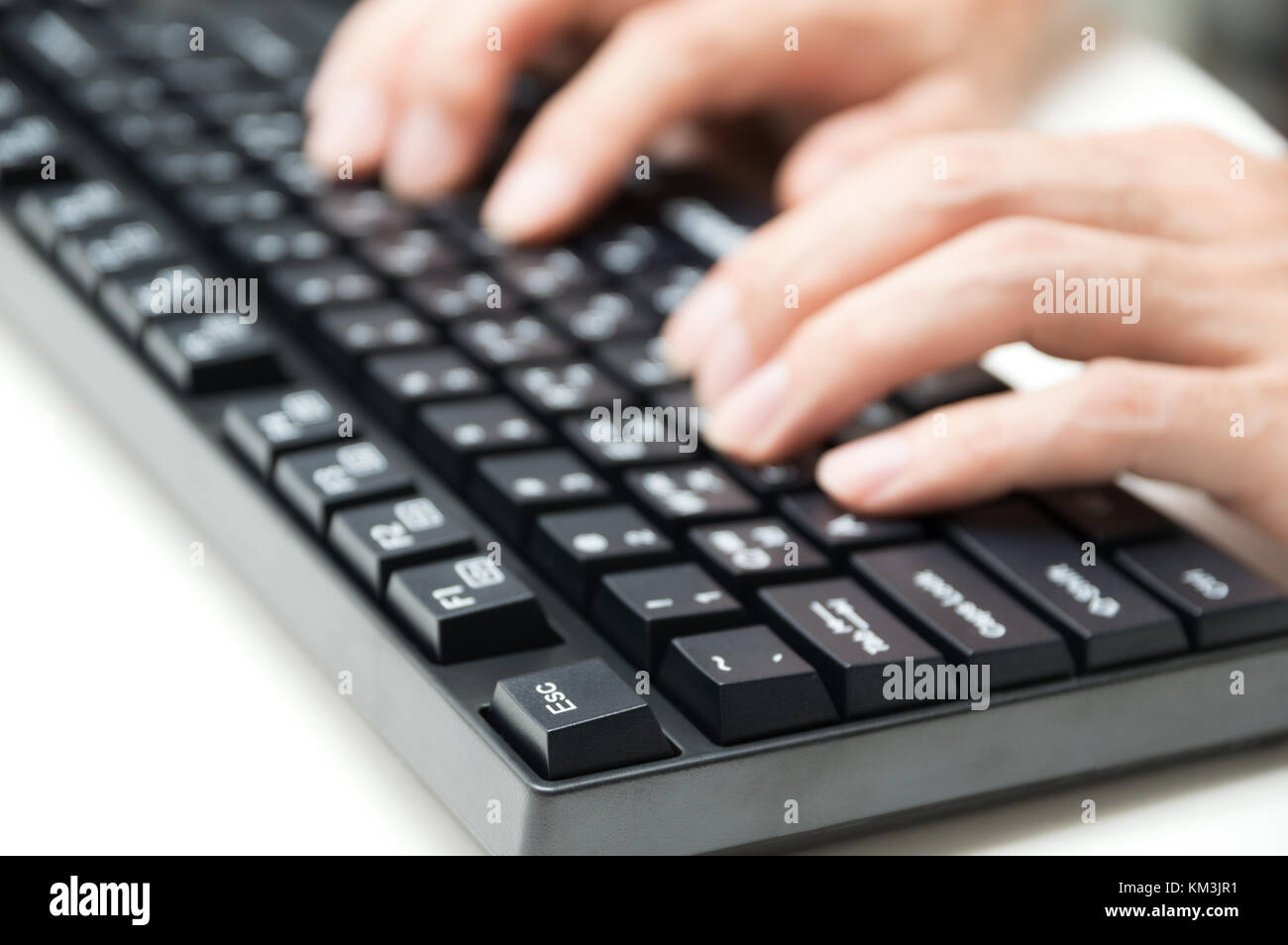 Hands using keyboard on white background Stock Photo - Alamy