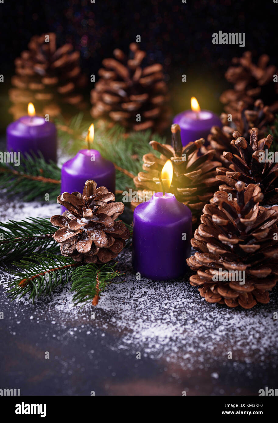 Pine cones and candle Stock Photo - Alamy