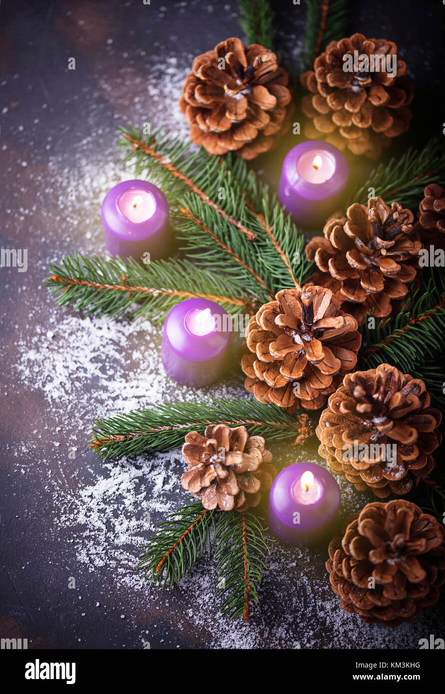 Pine cones and candle Stock Photo - Alamy