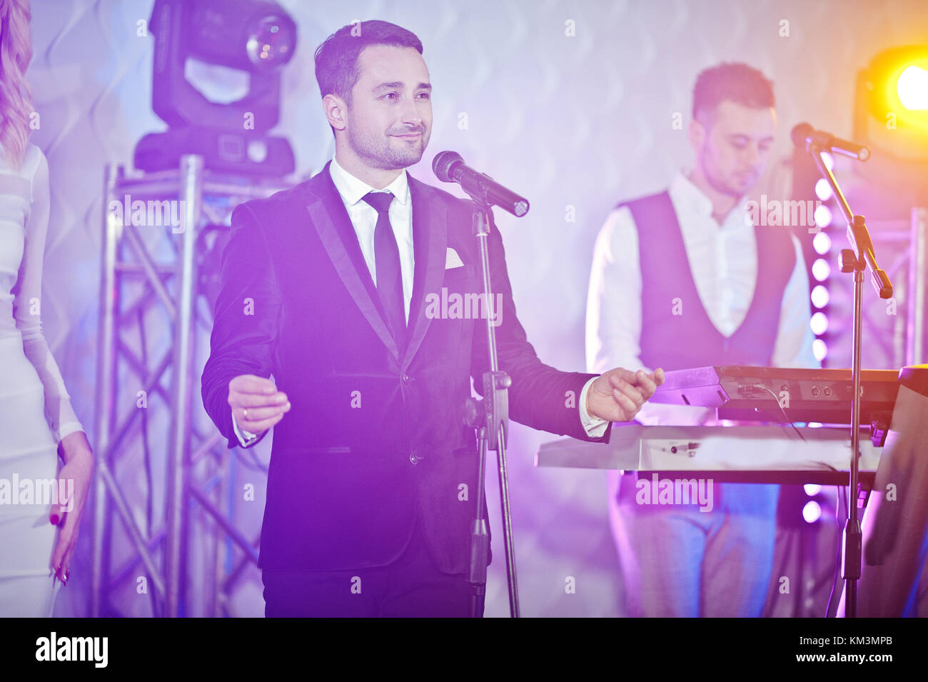 Musicial music live band performing on a stage with different lights ...