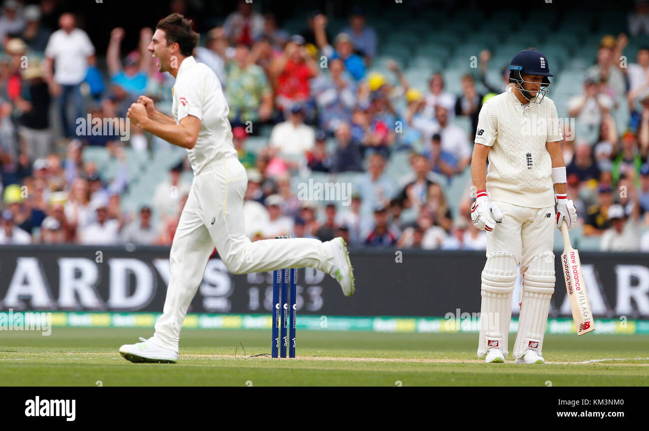 England's Joe Root looks dejected after Australia's Pat Cummins took ...