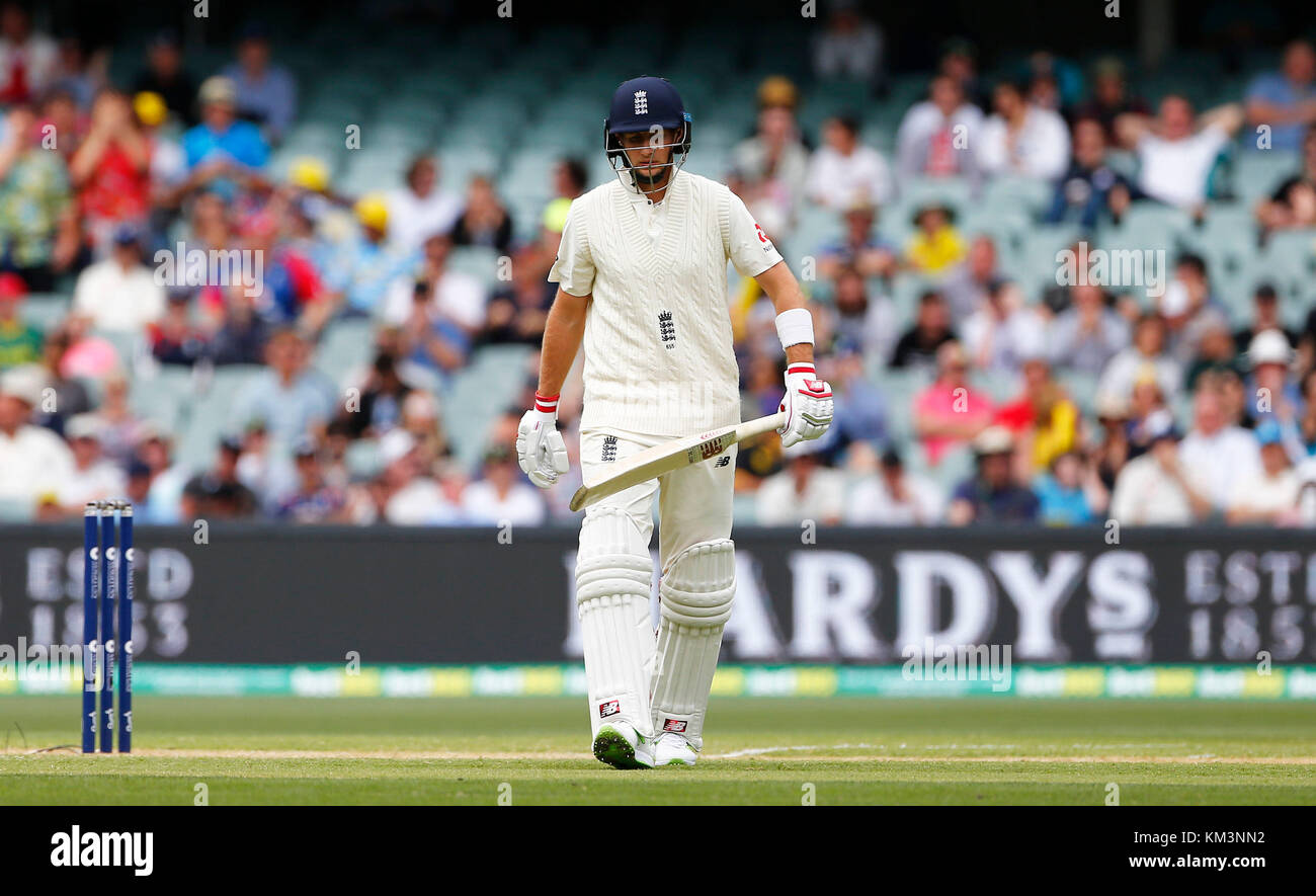 England's Joe Root looks dejected after Australia's Pat Cummins took ...