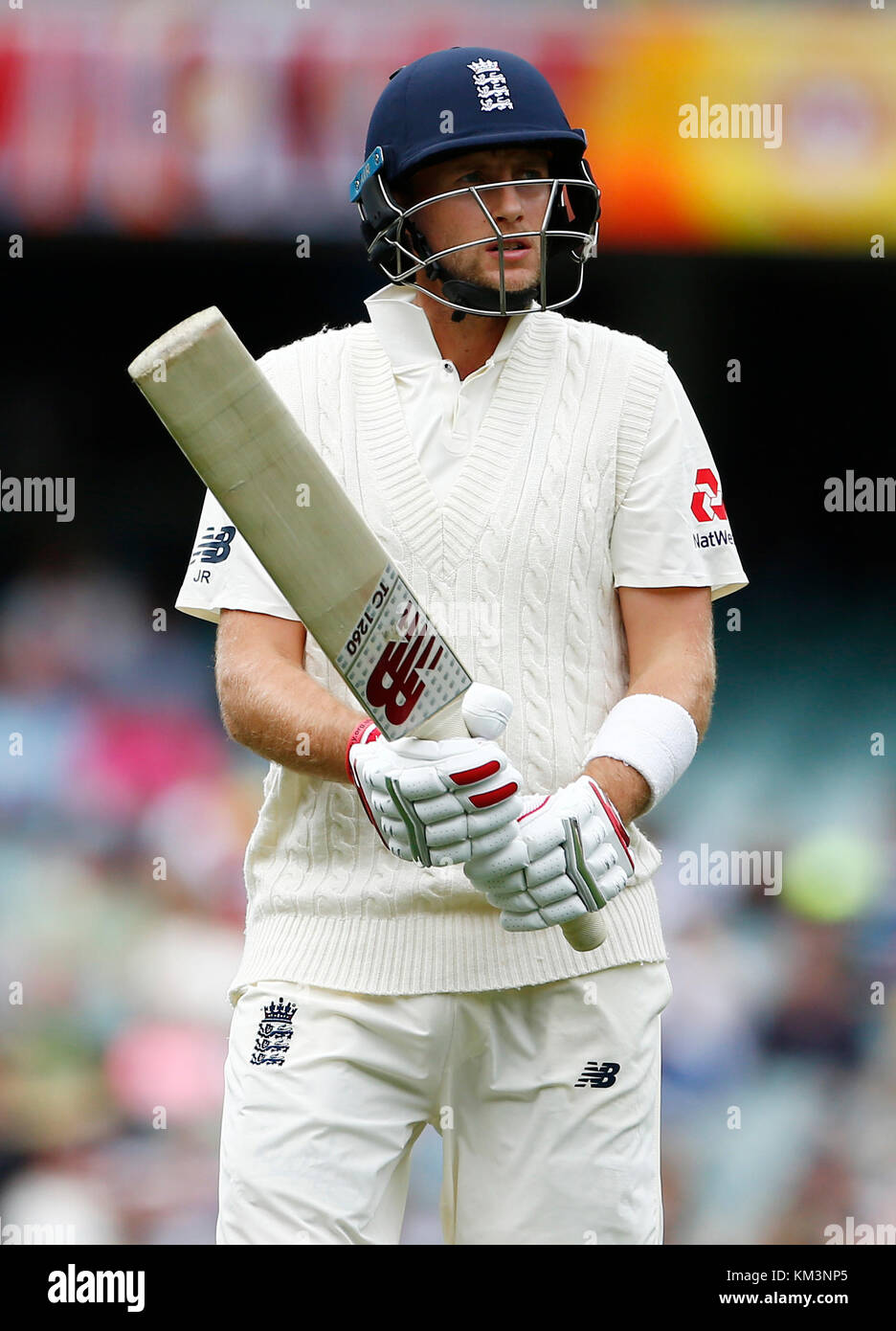 England's Joe Root looks dejected after Australia's Pat Cummins took ...