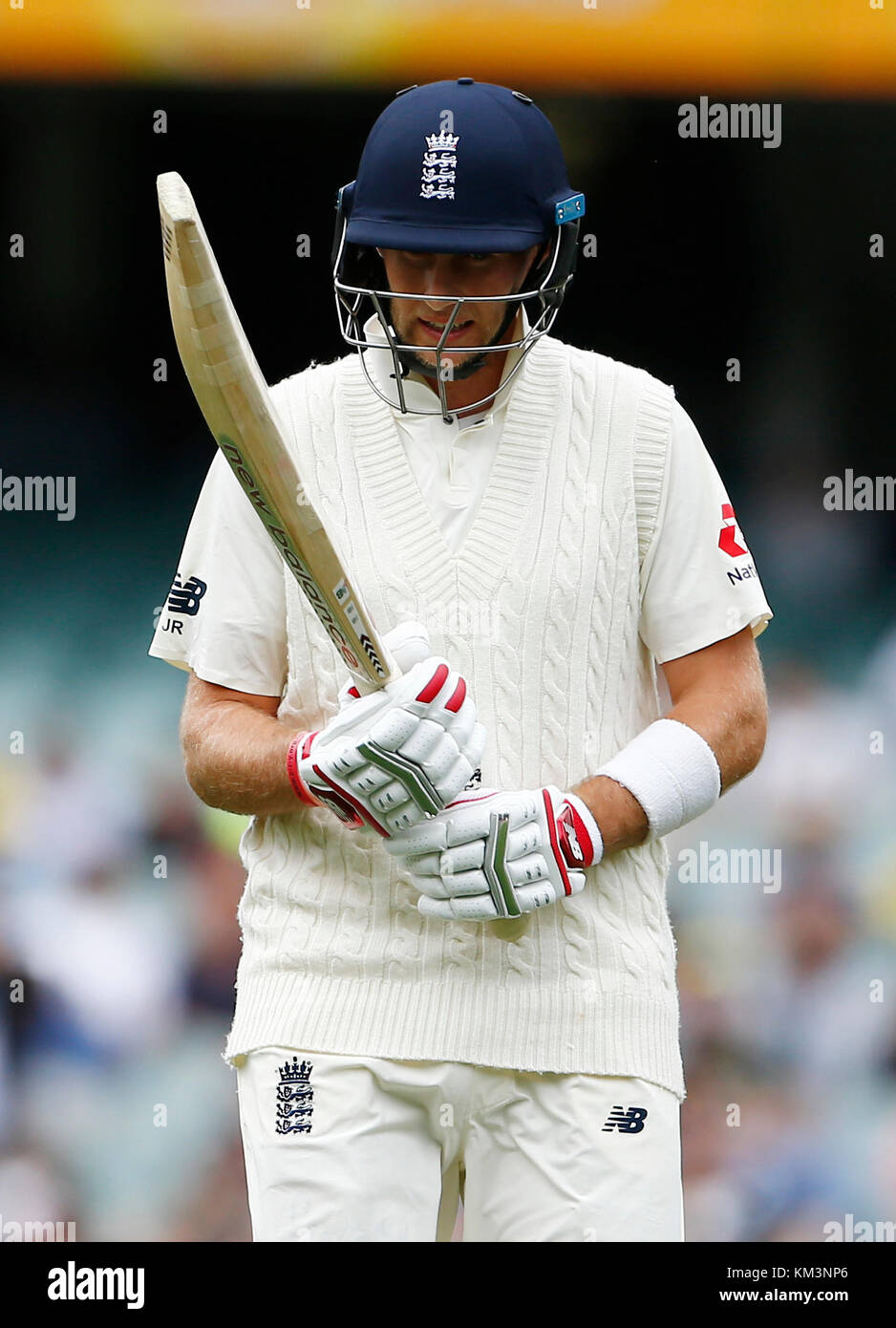 England's Joe Root looks dejected after Australia's Pat Cummins took ...