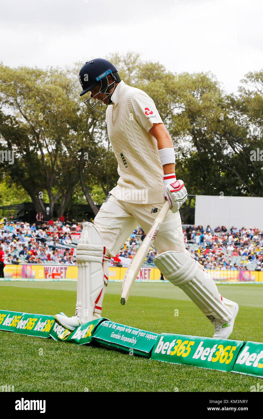 England's Joe Root looks dejected after Australia's Pat Cummins took ...