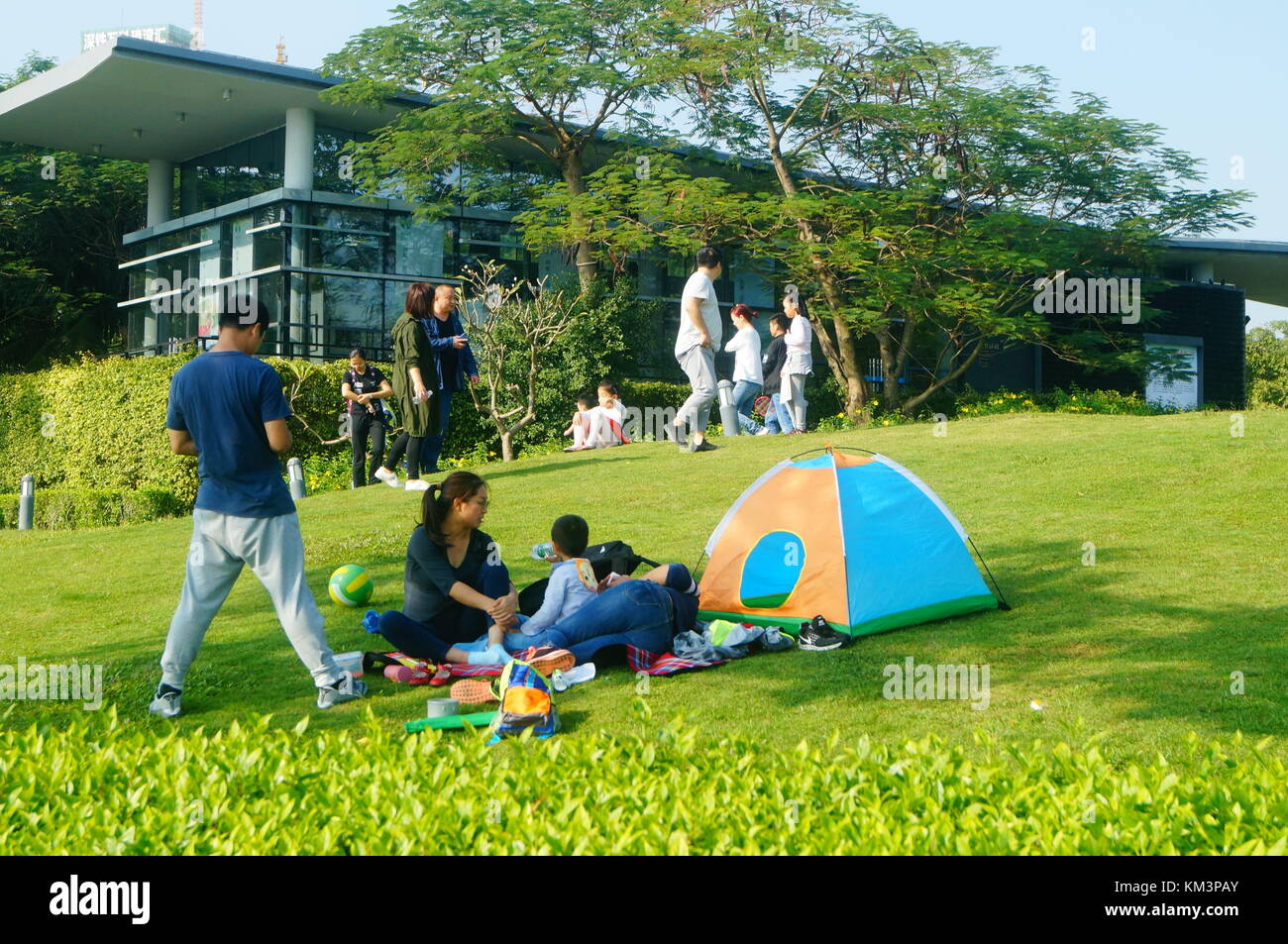 Outdoor lawn, tourists set up tents, leisure tourism Stock Photo - Alamy