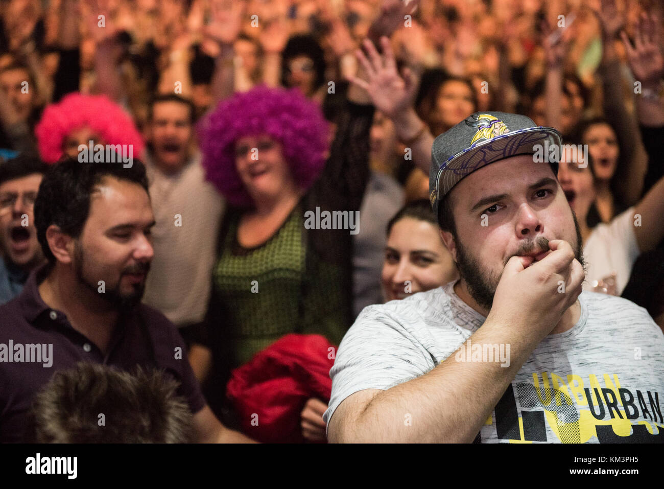 CLUJ NAPOCA, ROMANIA - NOVEMBER 19, 2017: Crowd of cheerful people ...