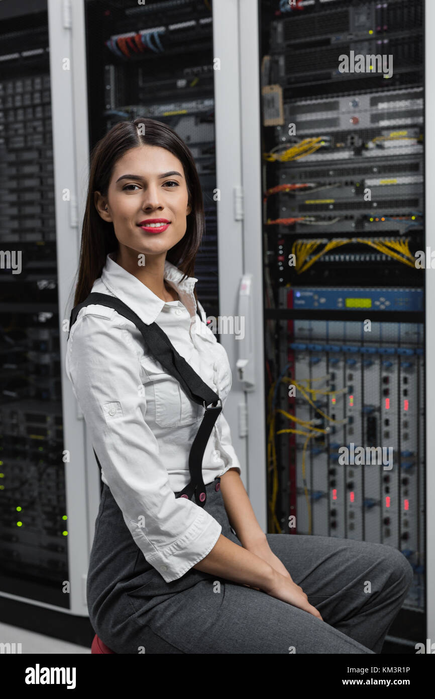 Young engineer businesswoman in network server room Stock Photo - Alamy
