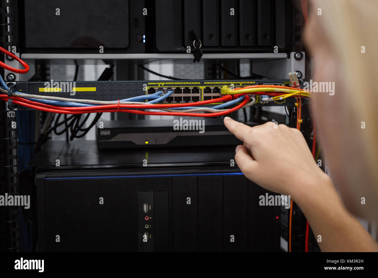 Close-up Of Engineers hand checking Server In Data Center Stock Photo ...