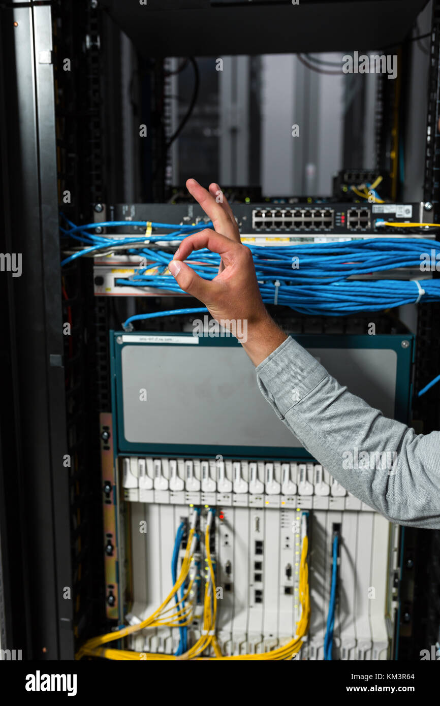 Close-up Of Engineers hand checking Server In Data Center Stock Photo ...