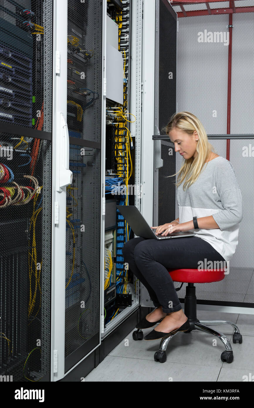 Portrait of a female executive in server room Stock Photo - Alamy