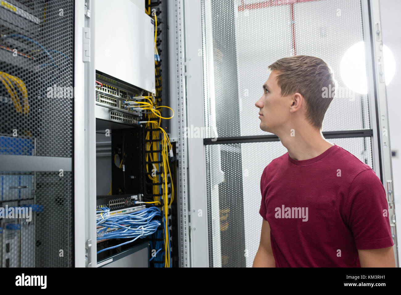 portrait of young man in data center Stock Photo - Alamy