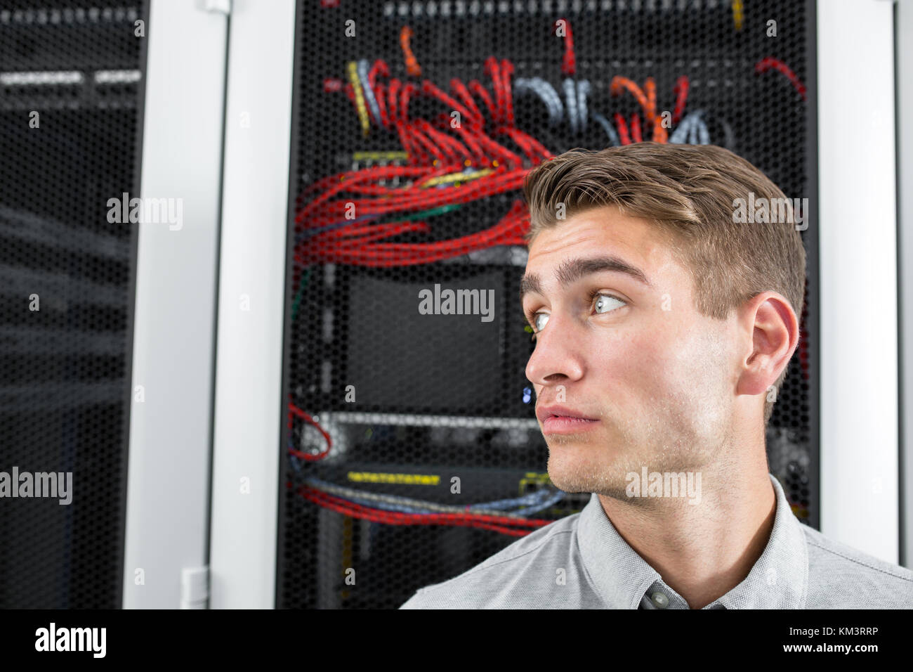portrait of young man in data center Stock Photo - Alamy