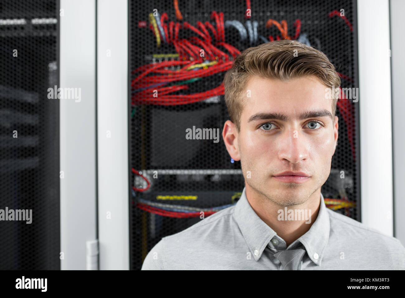 portrait of young man in data center Stock Photo - Alamy