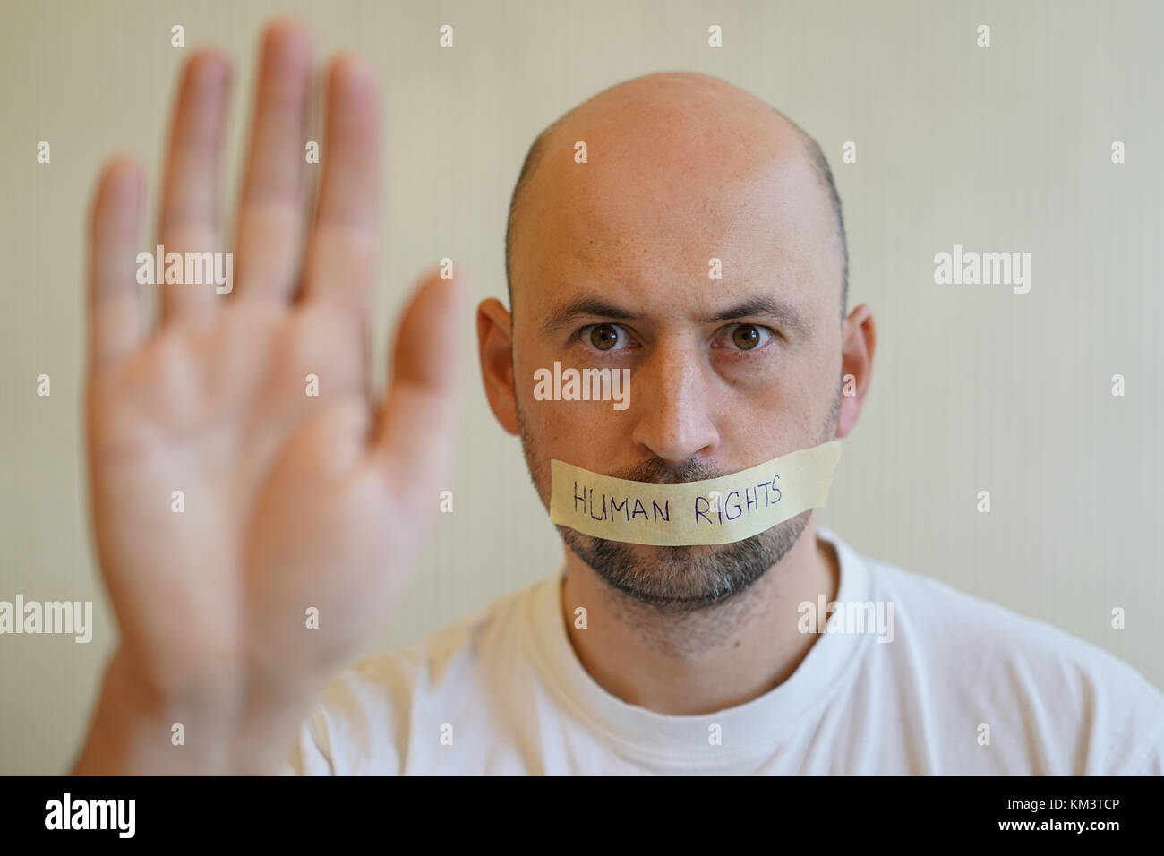 Abusing human rights hi-res stock photography and images - Alamy