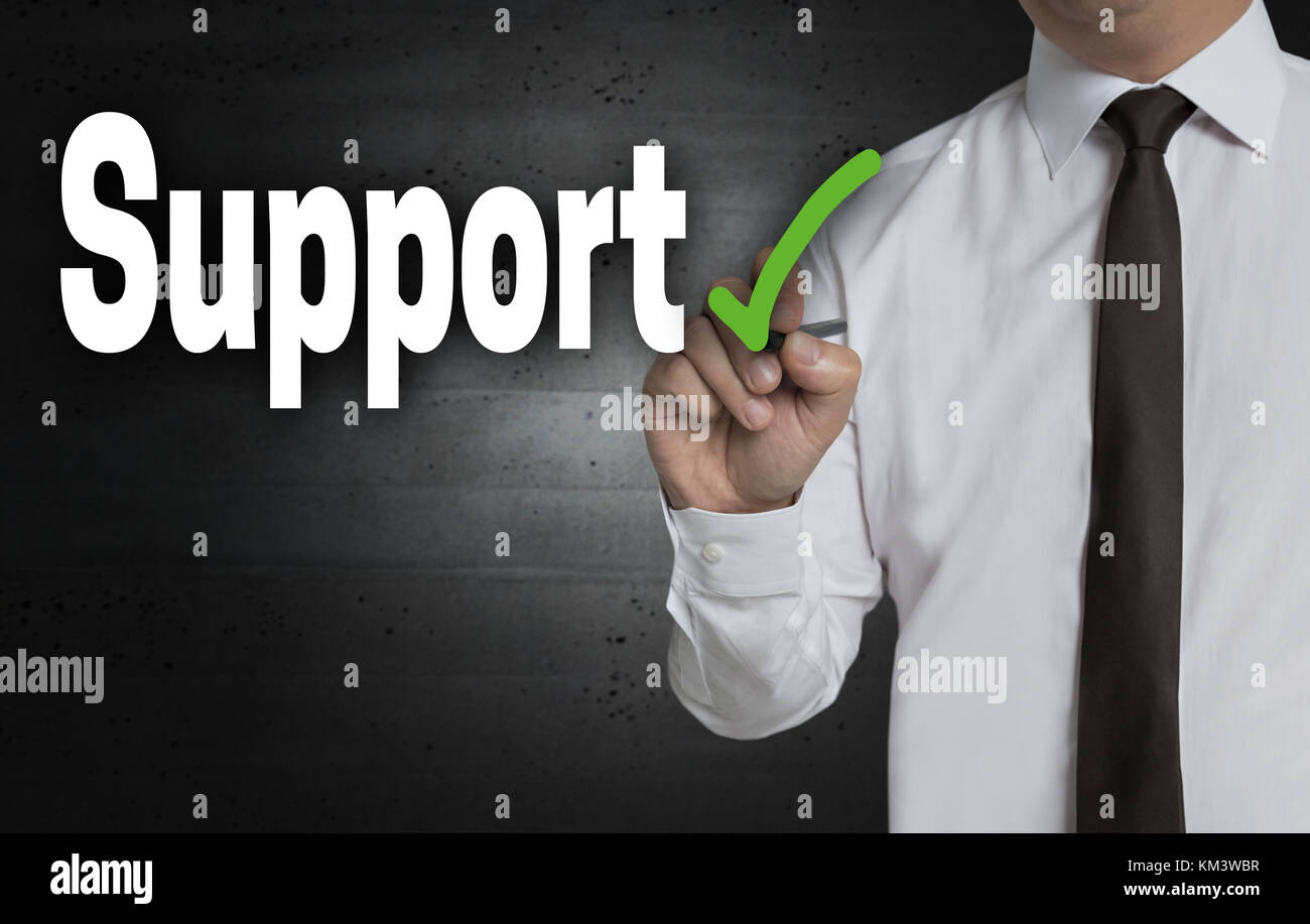 Support is written by businessman on screen Stock Photo - Alamy