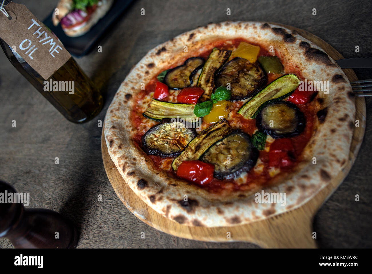 Authentic Italian Pizza on Rustic Surface Stock Photo - Alamy
