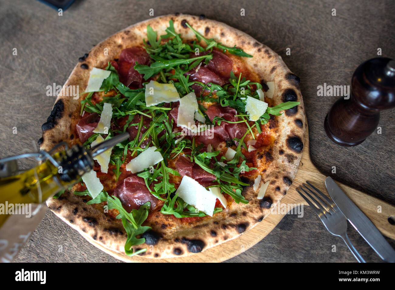 Authentic Italian Pizza on Rustic Surface Stock Photo - Alamy