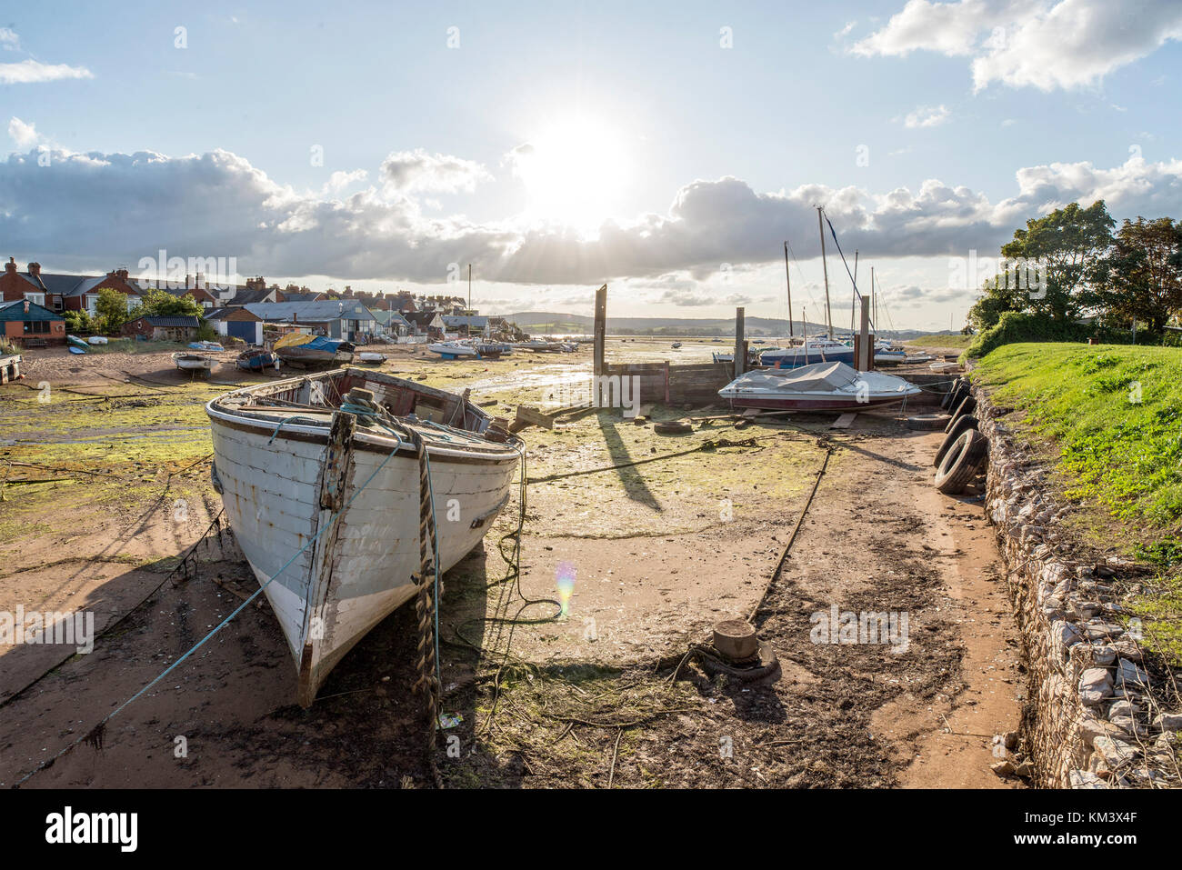 Boats Moored in Sunny Beach Scene Stock Photo - Alamy