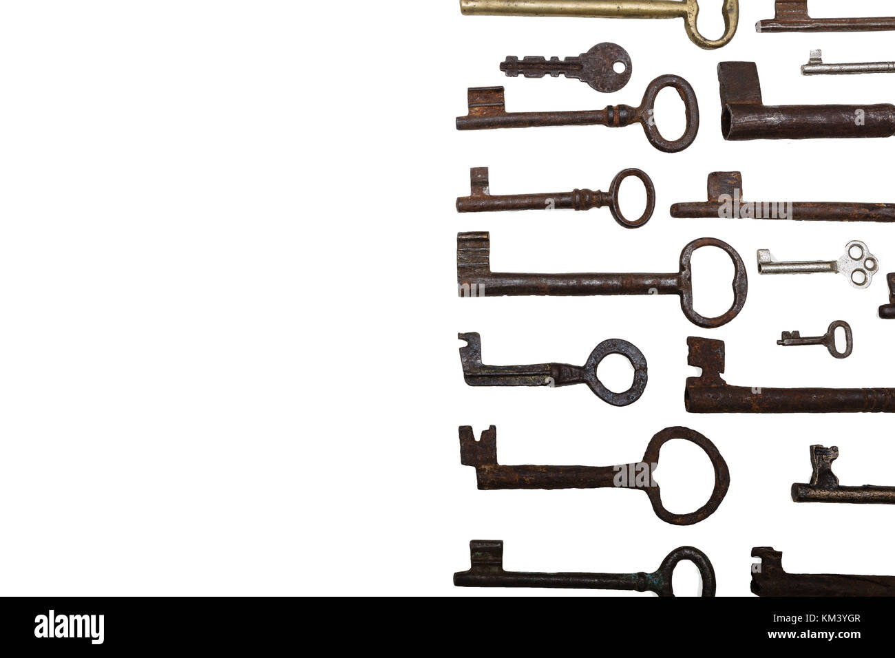 Different size old rusty keys isolated on white background with copy ...