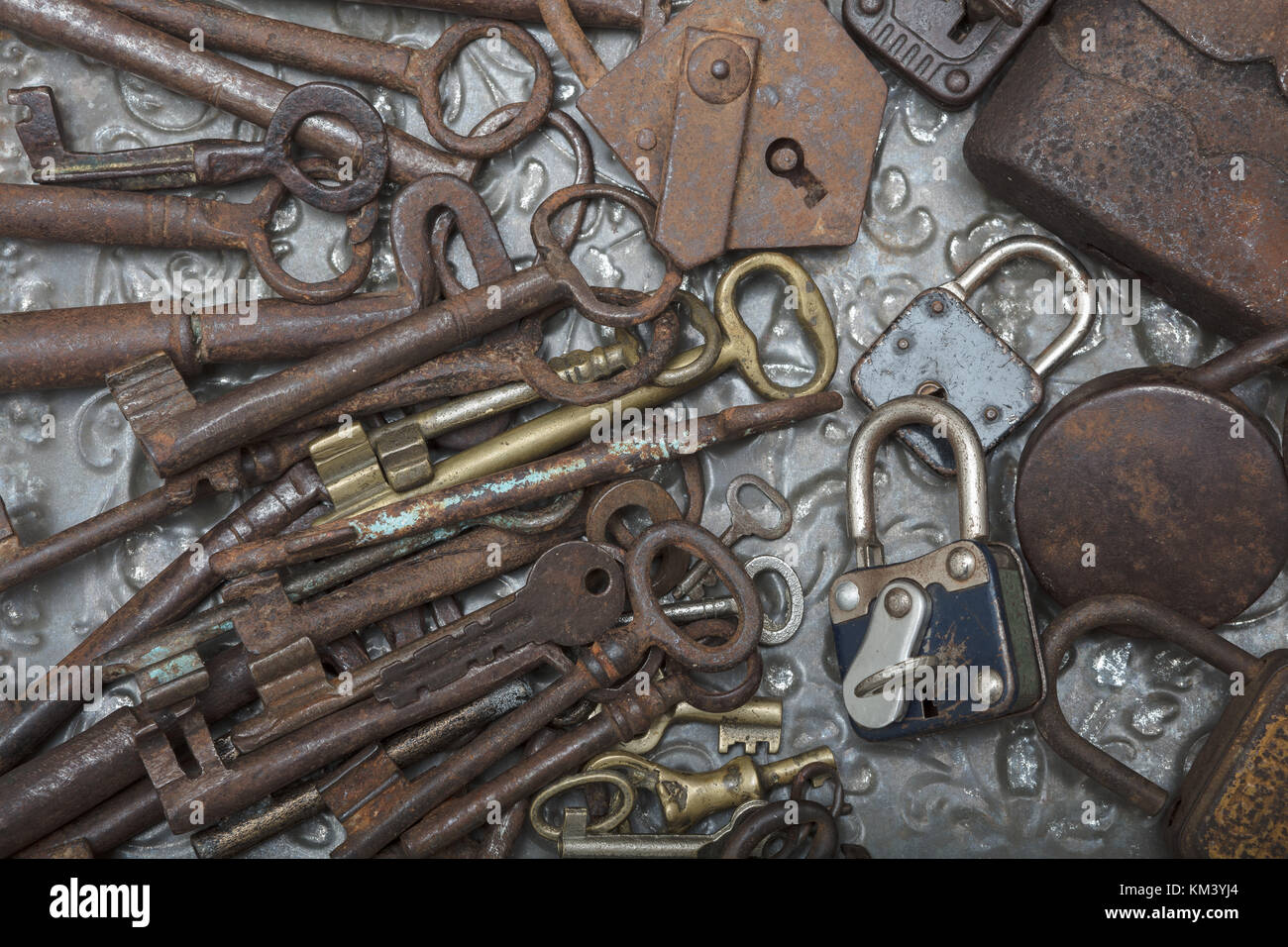 Vintage padlock and keys collection on metal background Stock Photo - Alamy