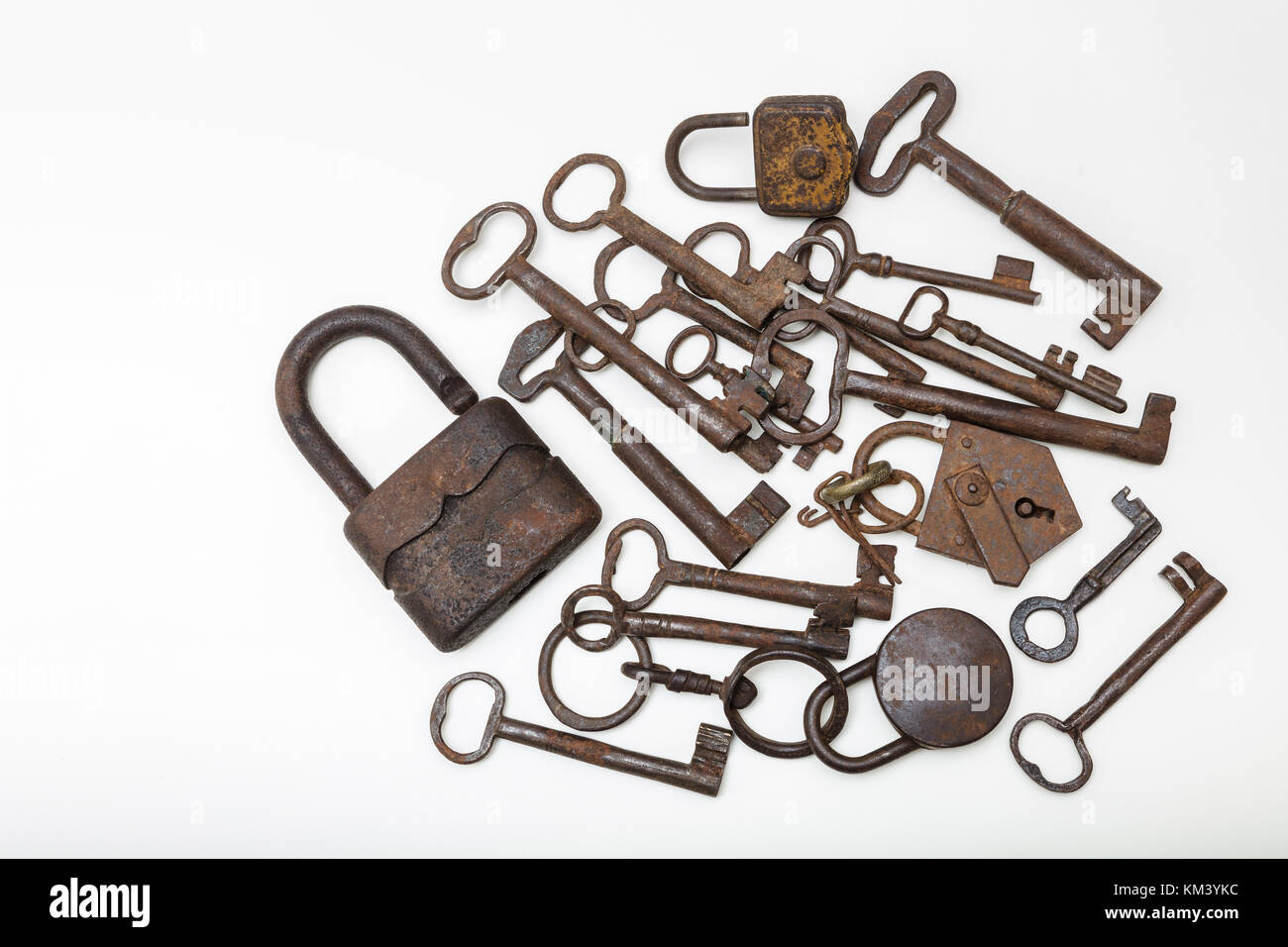 Vintage padlock and keys collection on white background with text space ...