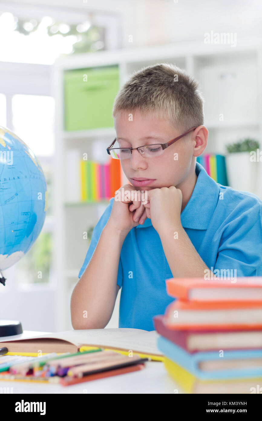 little blue boy thinking Stock Photo - Alamy
