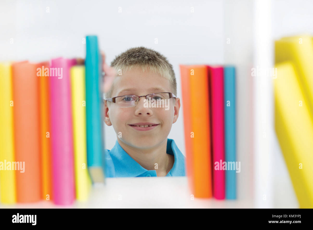 little boy in the library Stock Photo - Alamy
