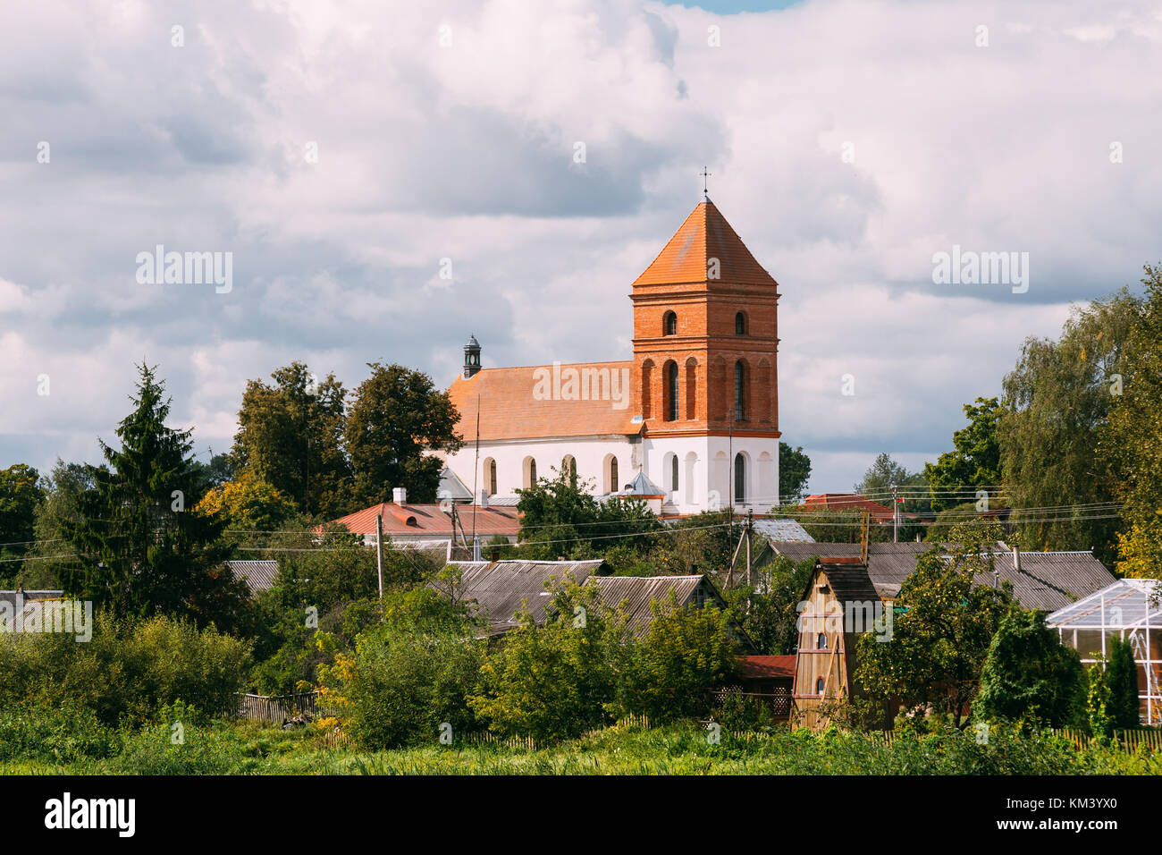 Mir, Belarus. Landscape Of Village Houses And Saint Nicolas Roman ...