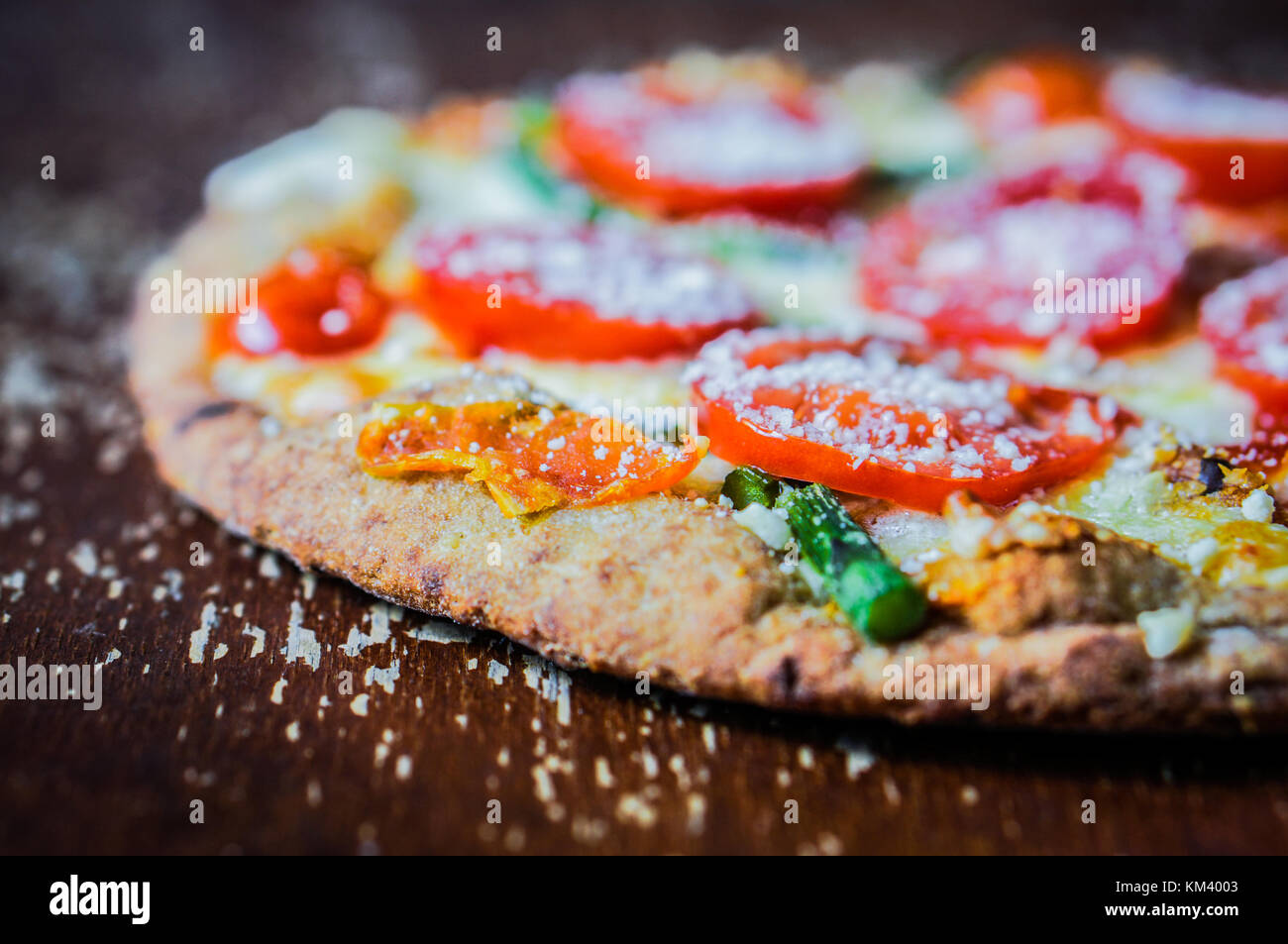 Ancient Pizza With Tomatoes And Asparagus Stock Photo - Alamy