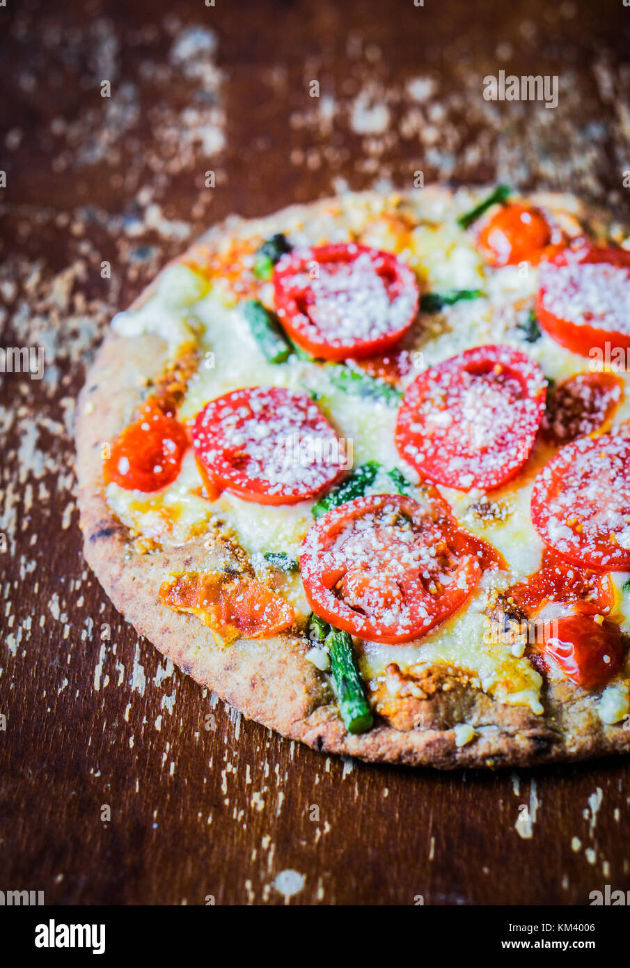 Ancient Pizza With Tomatoes And Asparagus Stock Photo - Alamy
