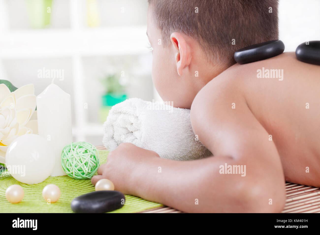 young boy relaxing in spa salon Stock Photo - Alamy