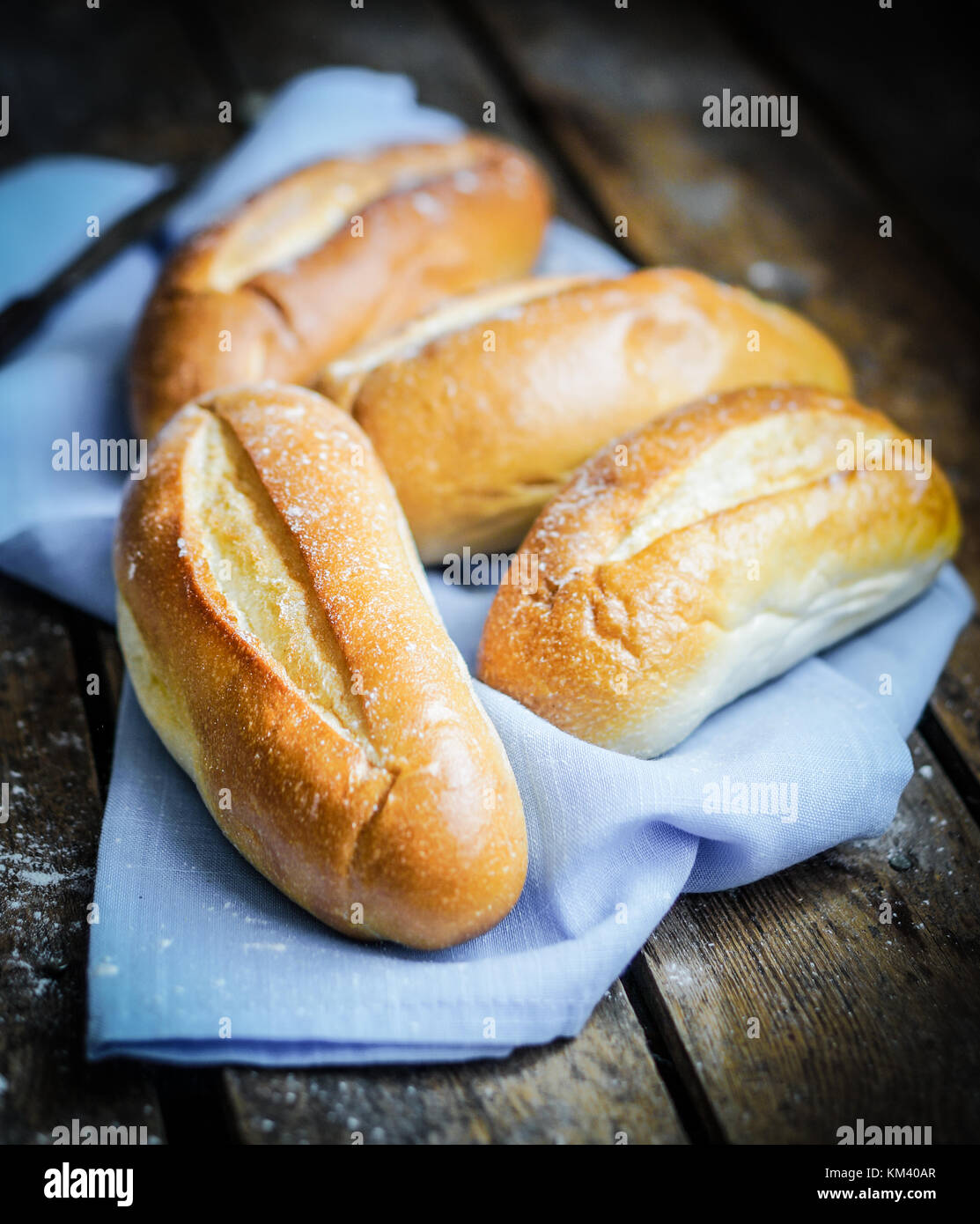 Bread Rolls On Rustic Wooden Background Stock Photo - Alamy