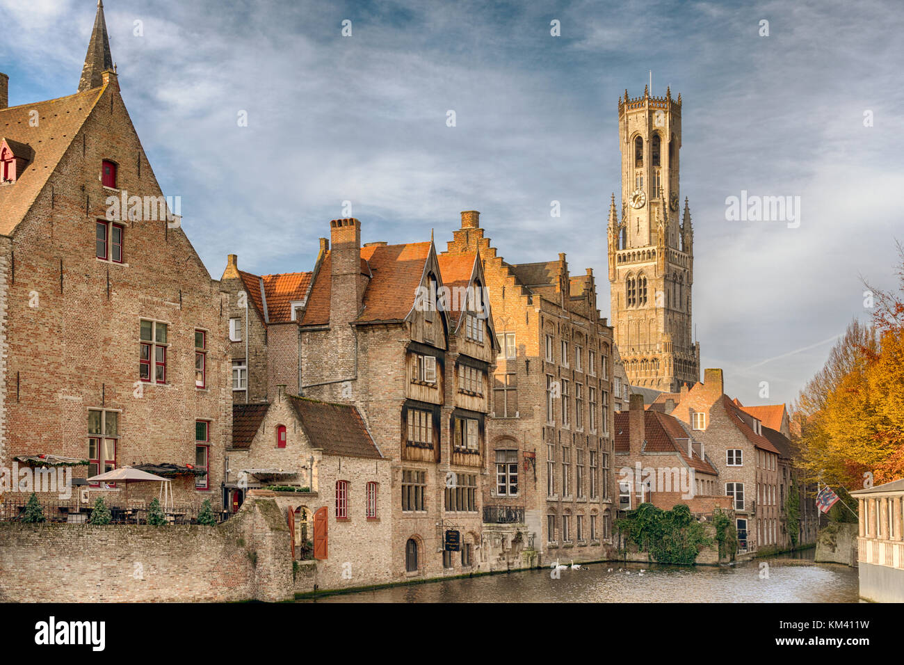 Bruges buildings, canal and belfry in November sunshine Stock Photo - Alamy