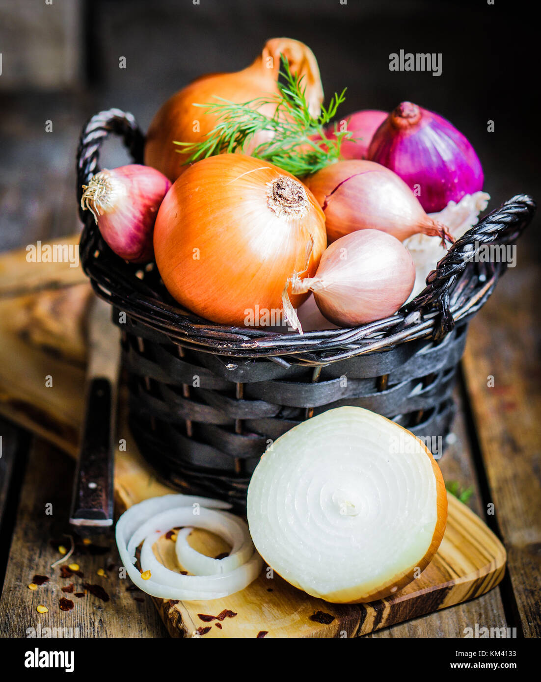 Colorful Onions In The Basket On Rustic Wooden Background Stock Photo ...