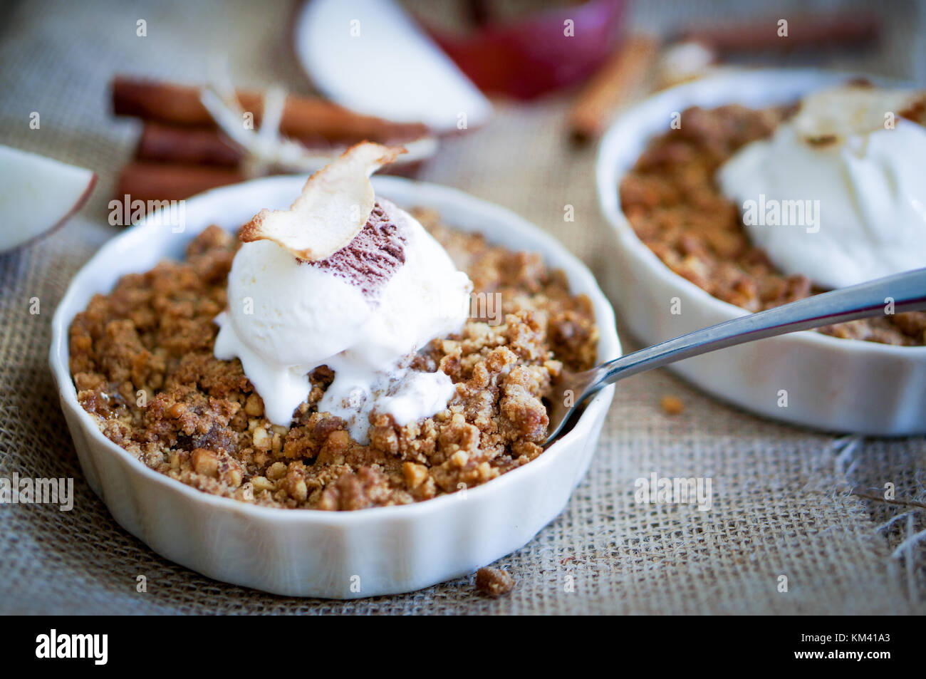Apple Crumble Dessert With Cinnamon And Vanilla Ice Cream On Wooden ...