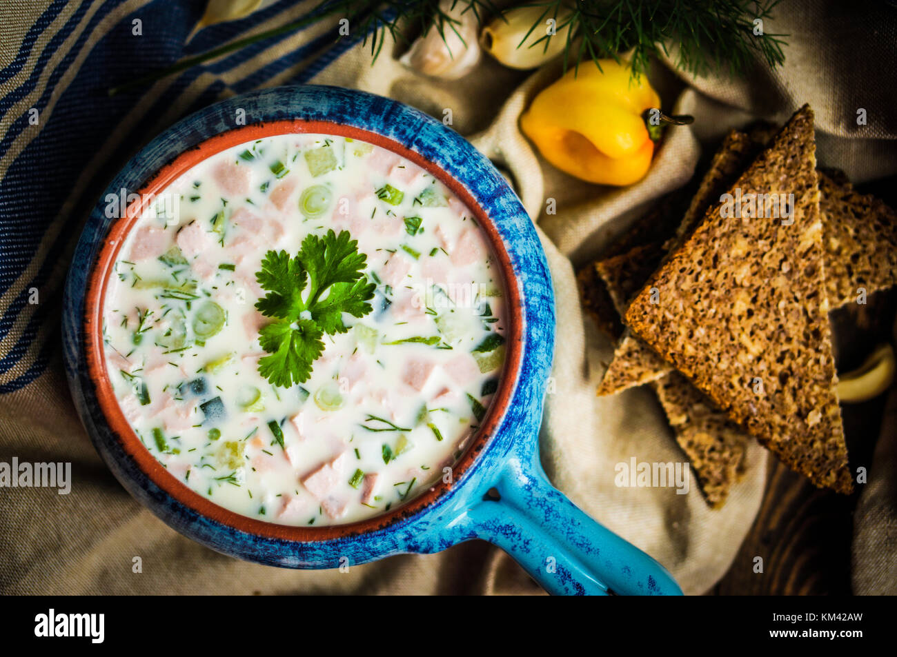 Cold Summer Soup On Rustic Background Stock Photo - Alamy