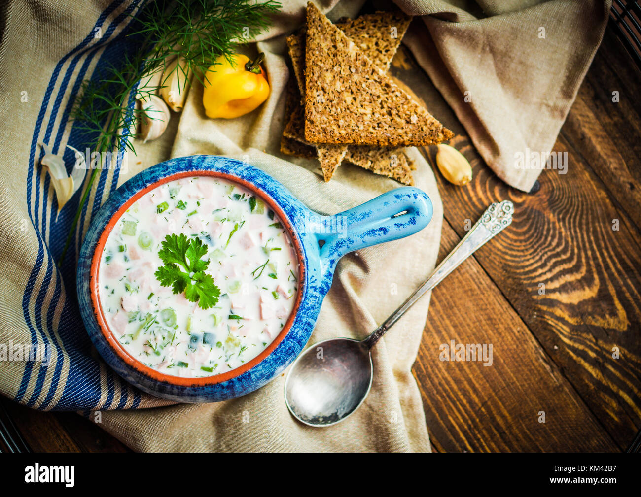 Cold Summer Soup On Rustic Background Stock Photo - Alamy