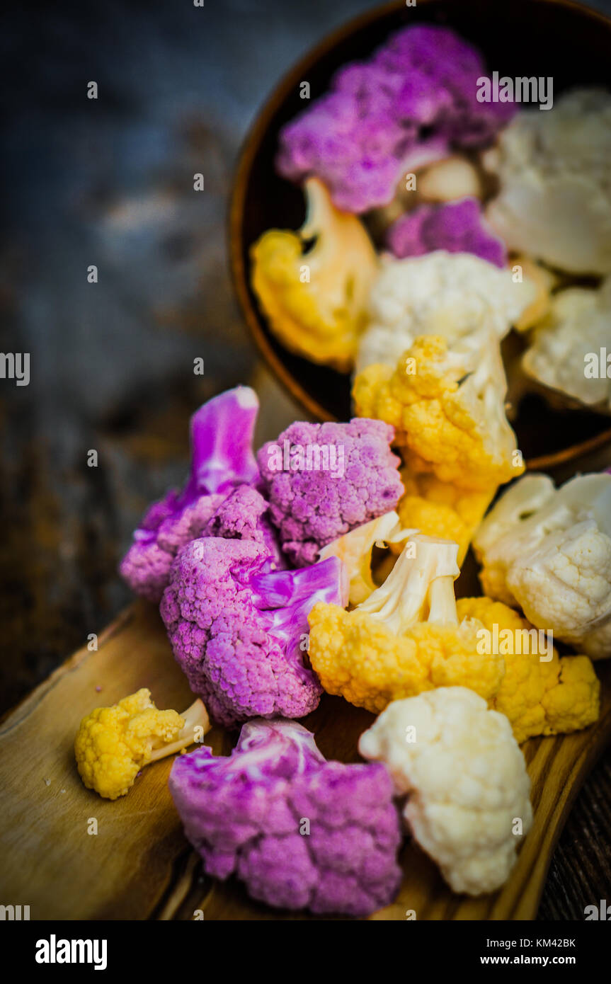Colorful Cauliflower On Rustic Background Stock Photo - Alamy