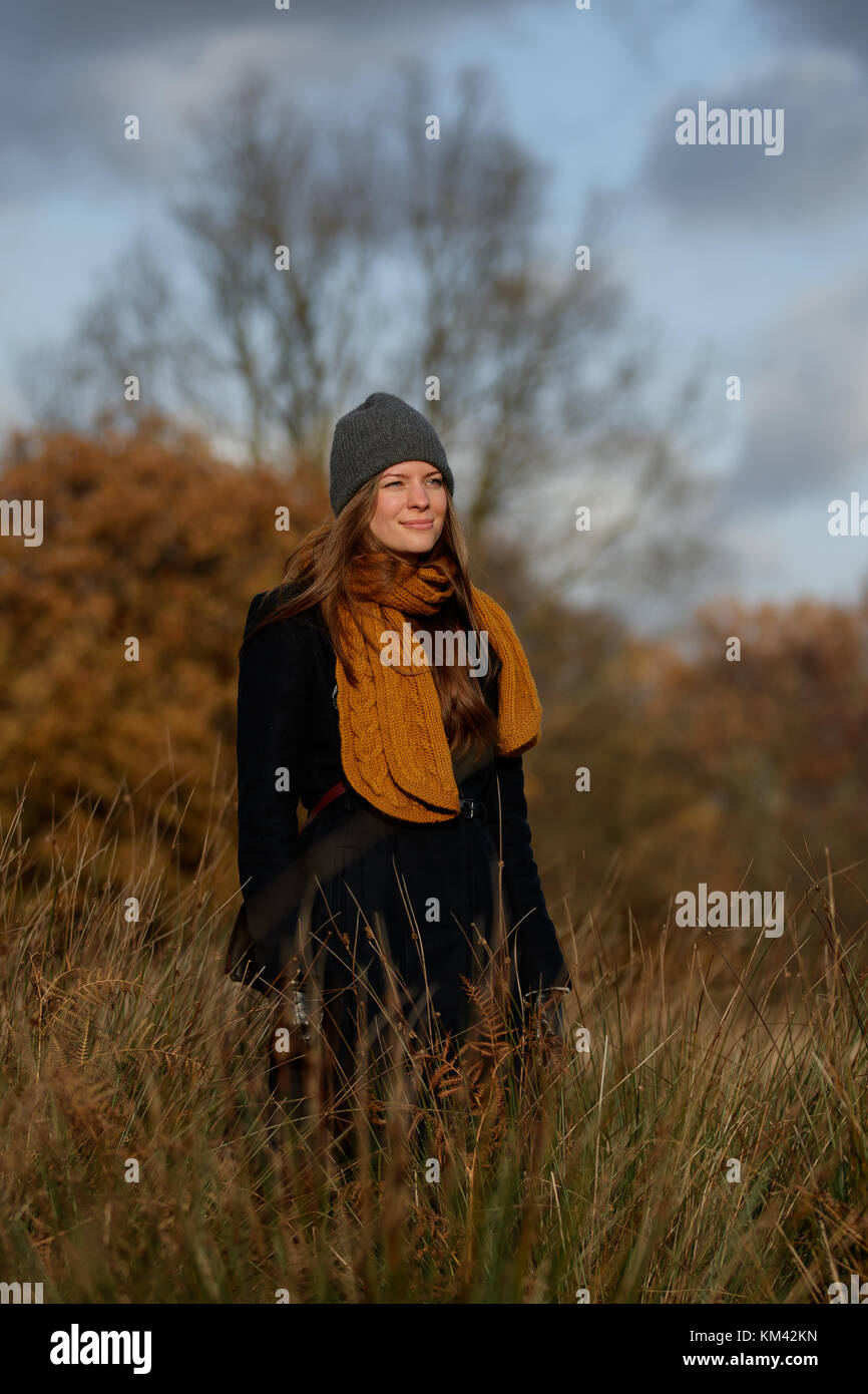 Young woman walking in a countryside park Stock Photo - Alamy